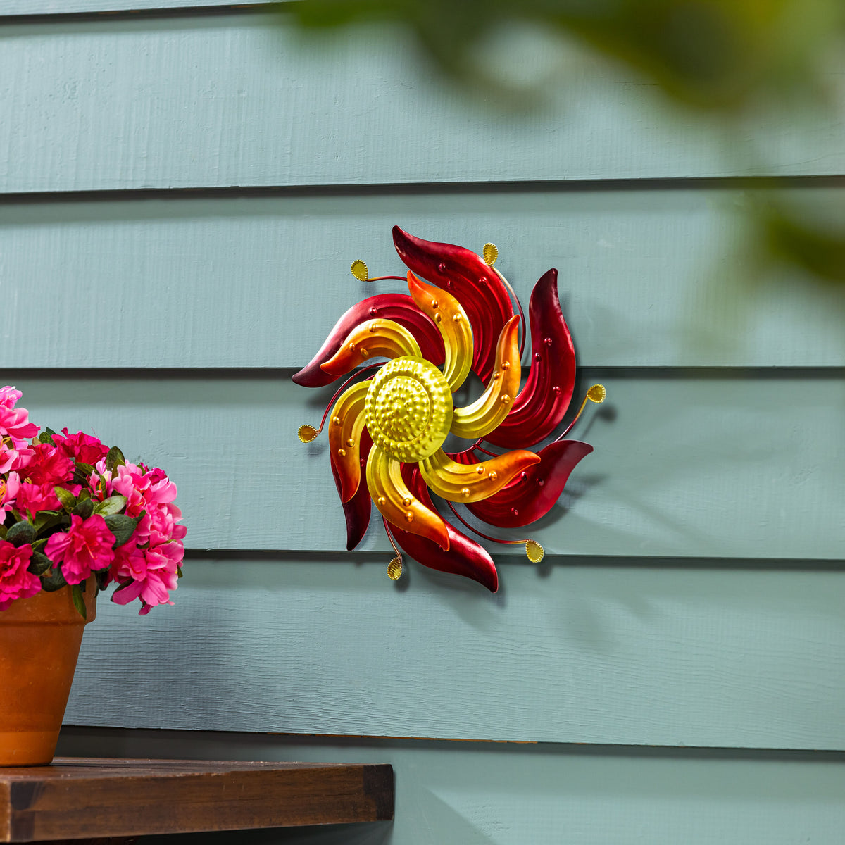 Celestial Swirl Red Wall Spinner 13"D – Plow & Hearth